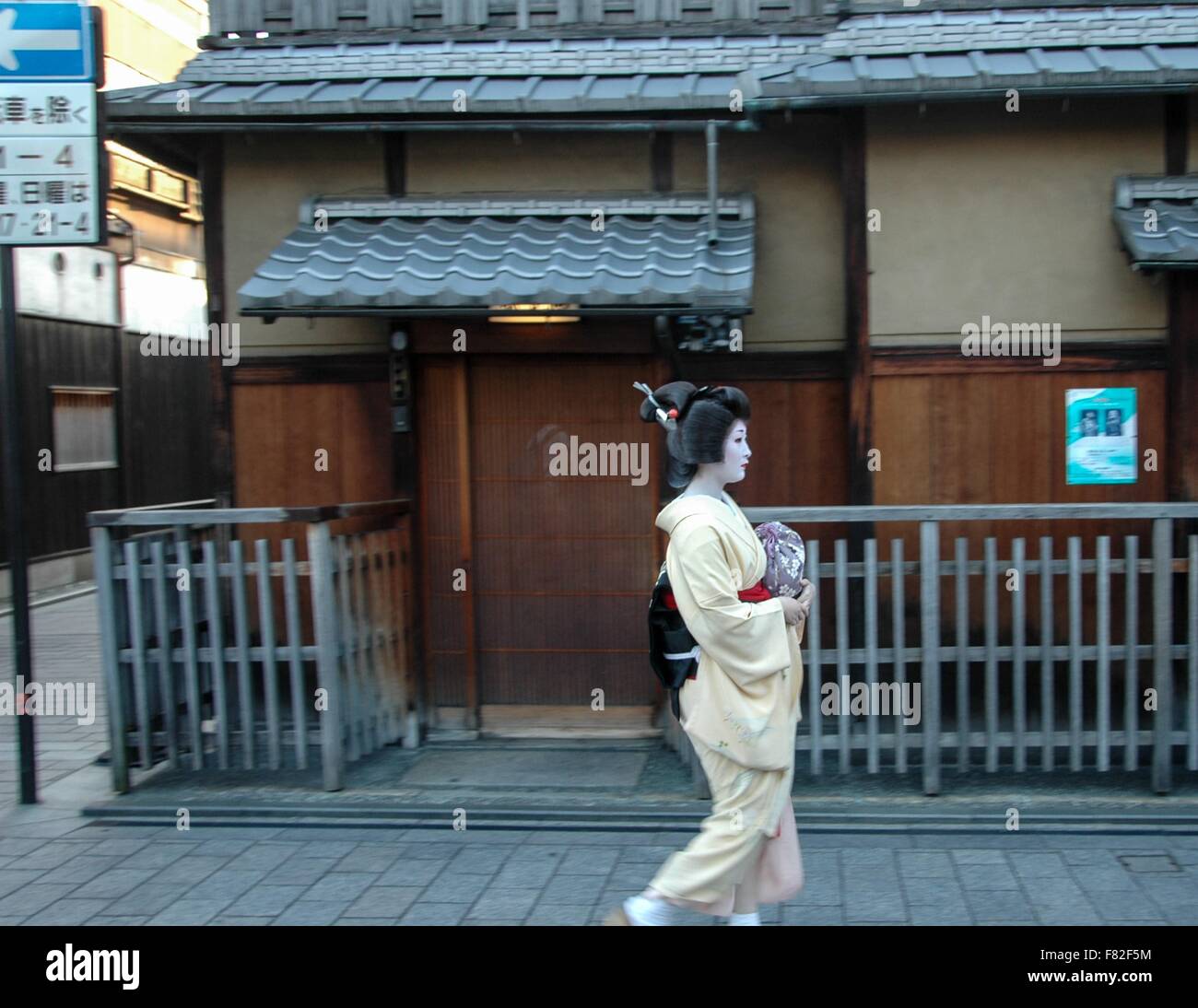 A geisha strolls through the Gion district in Kyoto, Japan Stock Photo ...