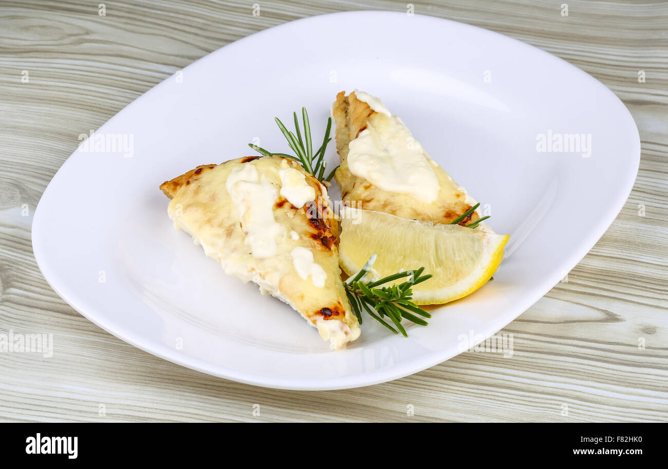 Baked perch fillet with rosemary and lemon Stock Photo - Alamy