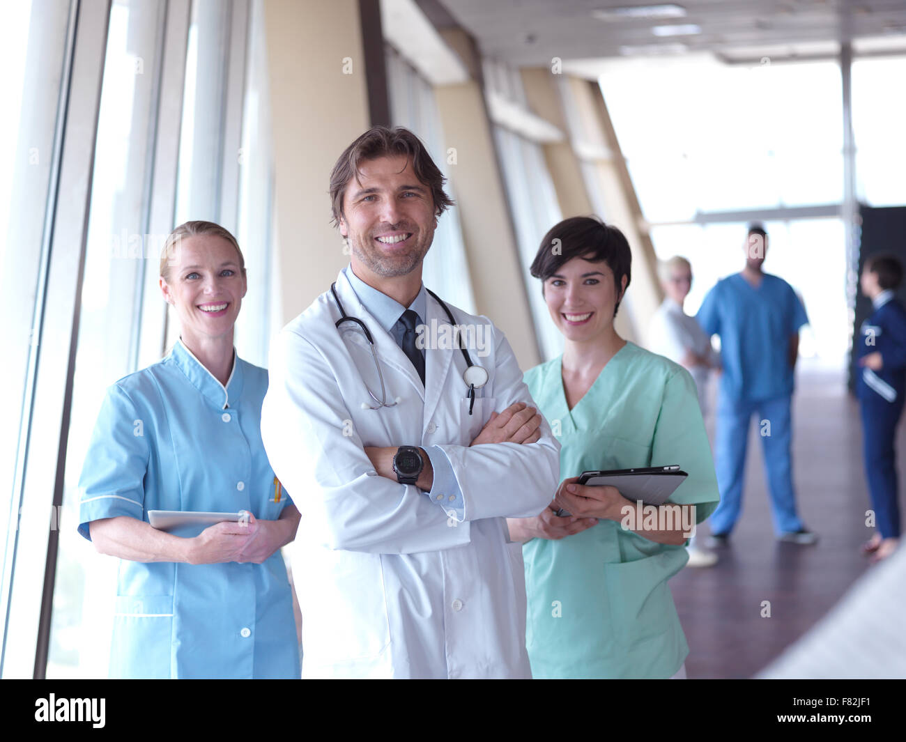 group of medical staff at hospital, doctors team standing together ...