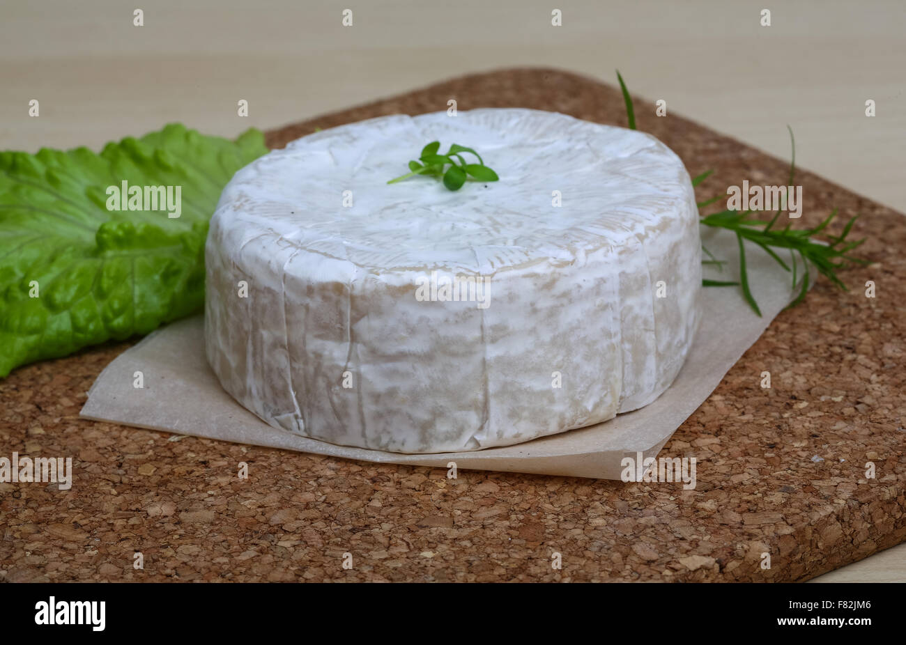 Camembert brie cheese with herbs on the wood background Stock Photo - Alamy