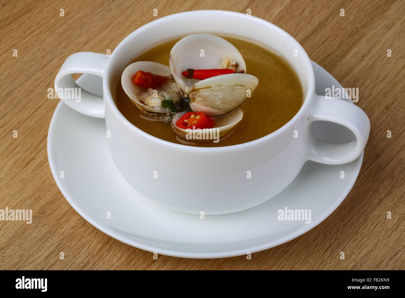 Asian traditional Shell soup on the wood background Stock Photo - Alamy