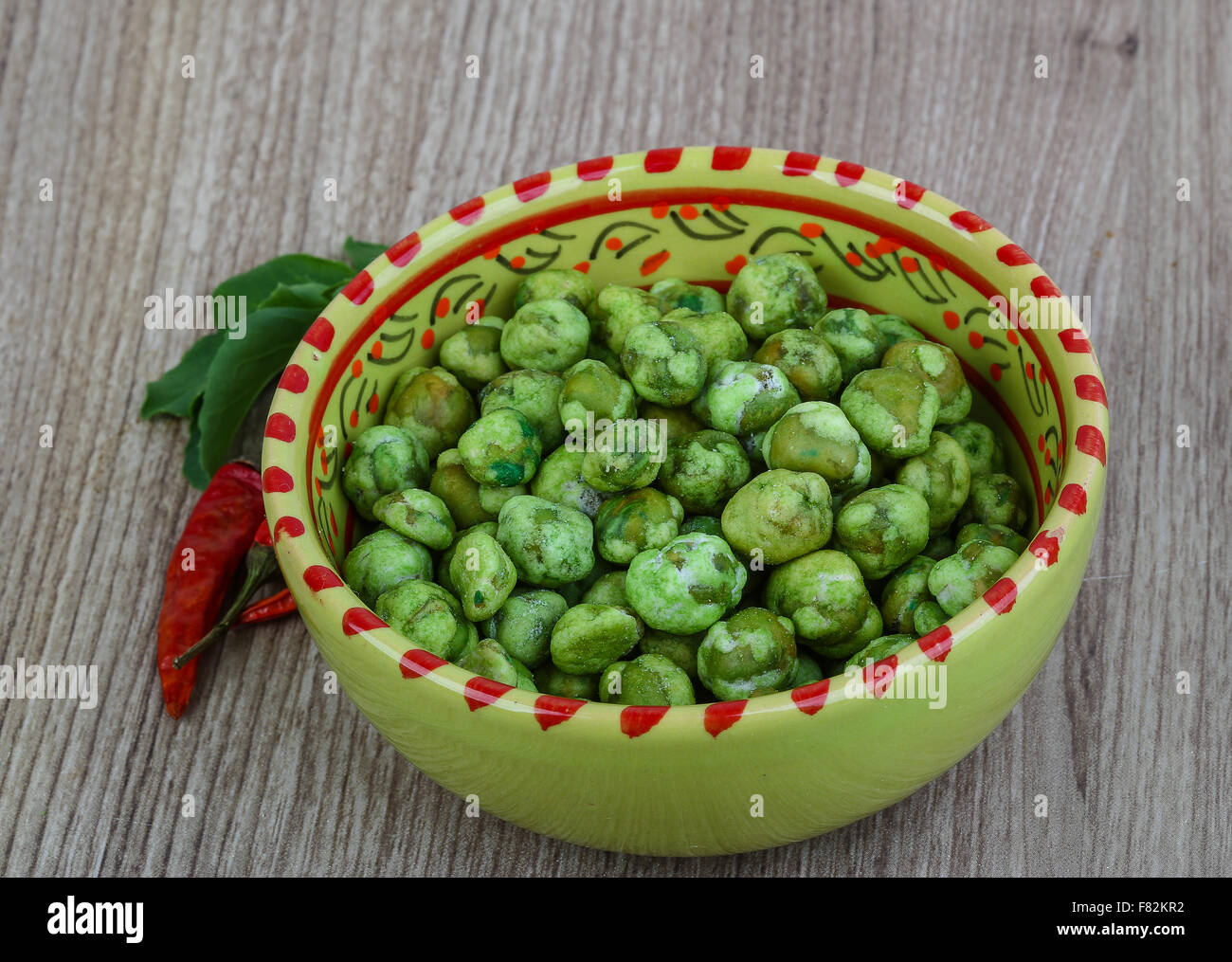 Japan traditional cuisime - Wasabi peas on the wood background Stock ...