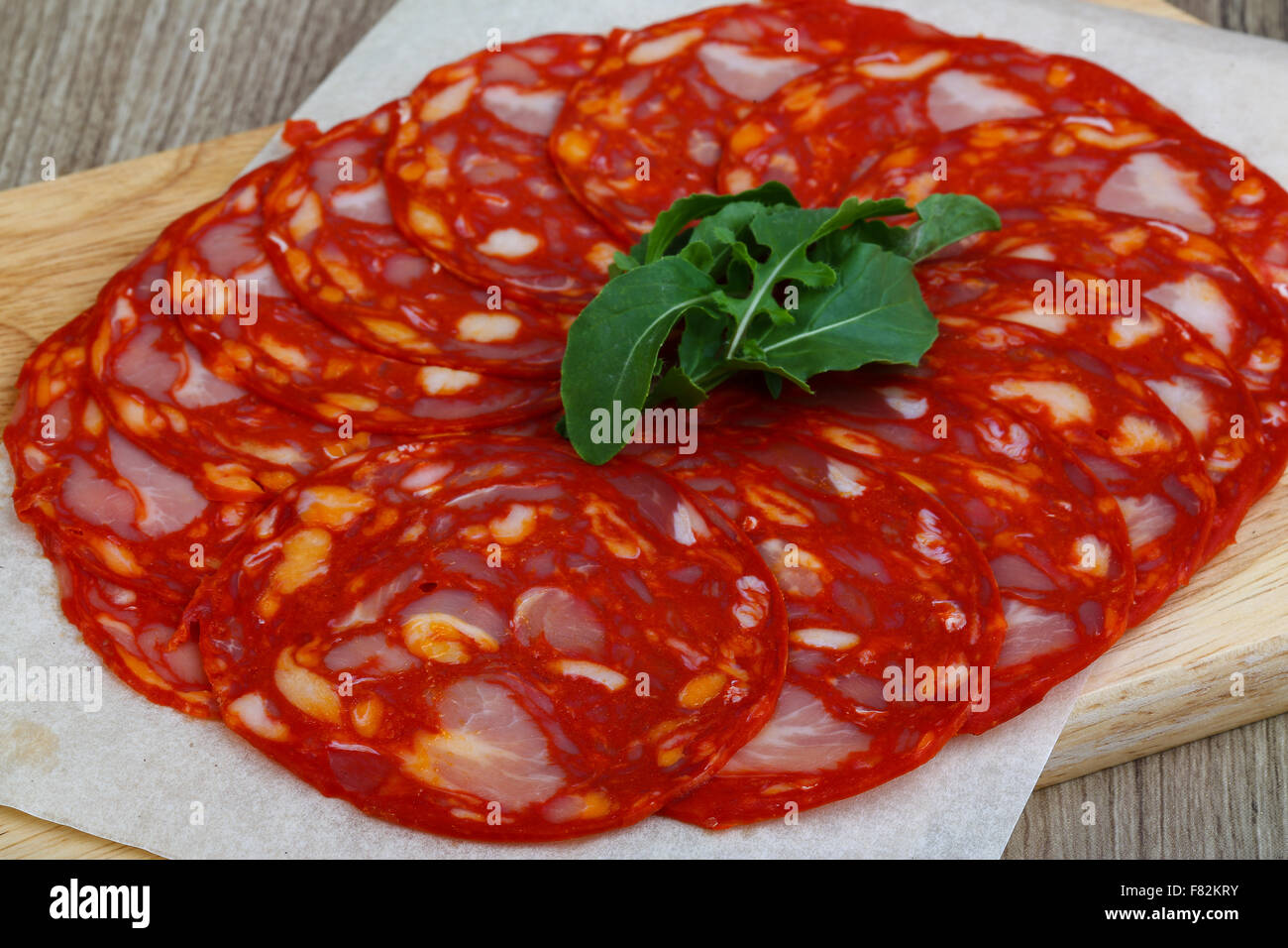 Traditional Spanish salami - Chorizo sausage on the wood background ...