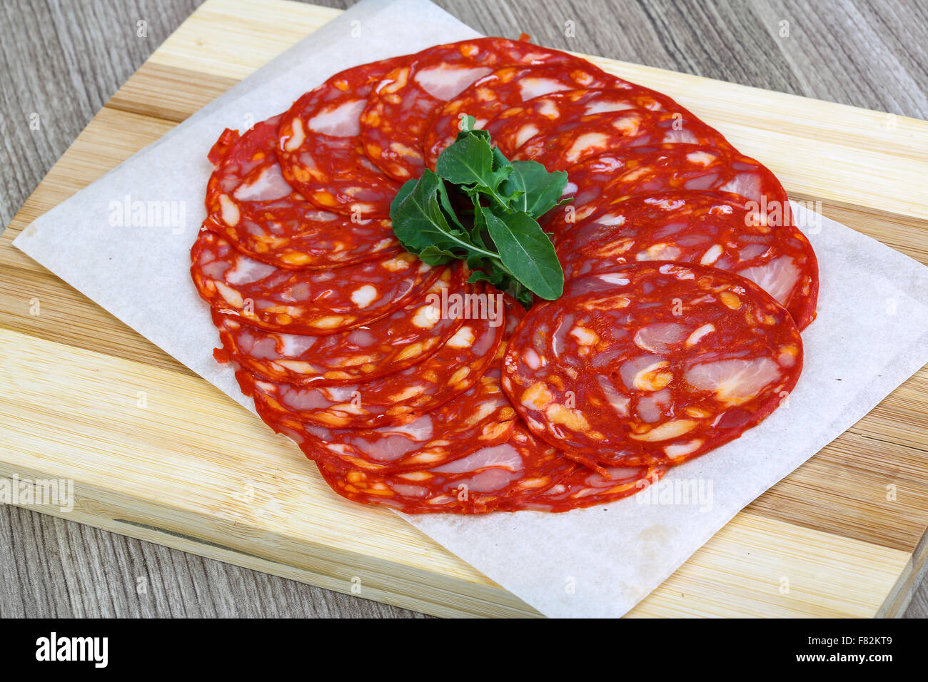 Traditional Spanish salami - Chorizo sausage on the wood background ...