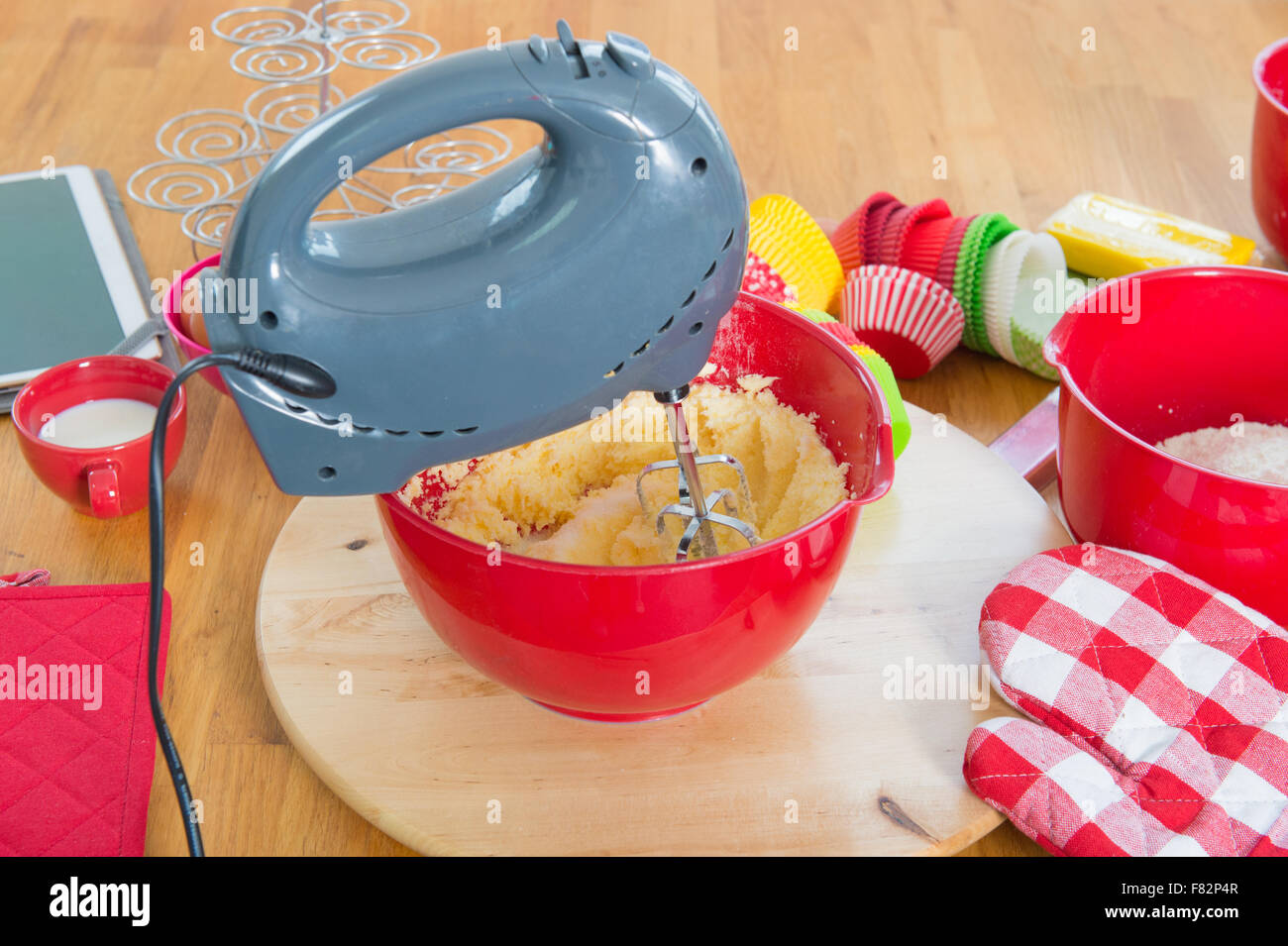 Baking cupcakes with metal form and paper models Stock Photo - Alamy