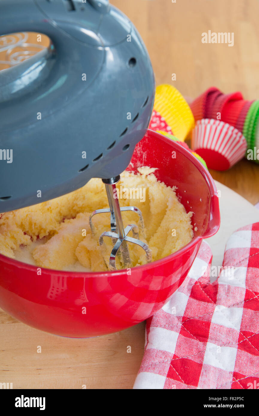 Baking cupcakes with metal form and paper models Stock Photo - Alamy