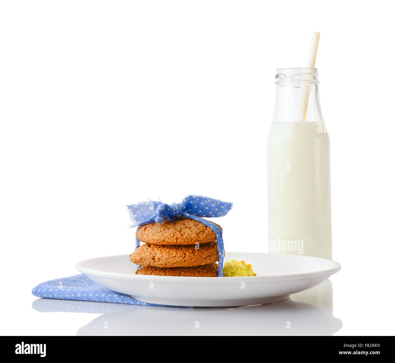 Stack of three homemade oatmeal cookies tied with blue ribbon and tiny ...
