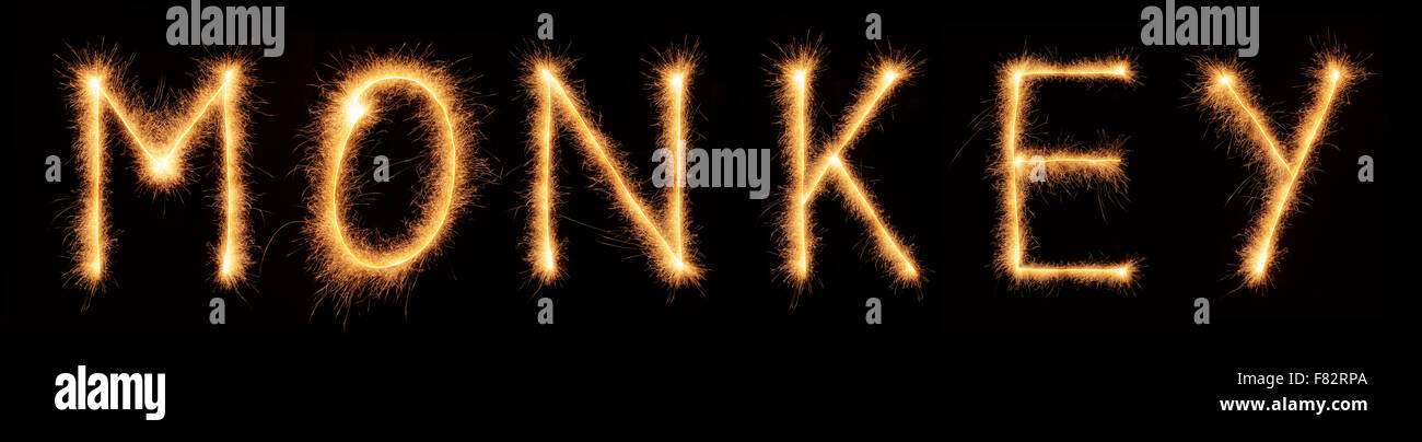 "MONKEY" lettering drawn with bengali sparkles isolated on black ...
