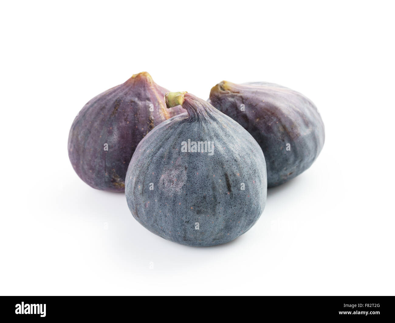 three fresh ripe figs isolated on white Stock Photo - Alamy