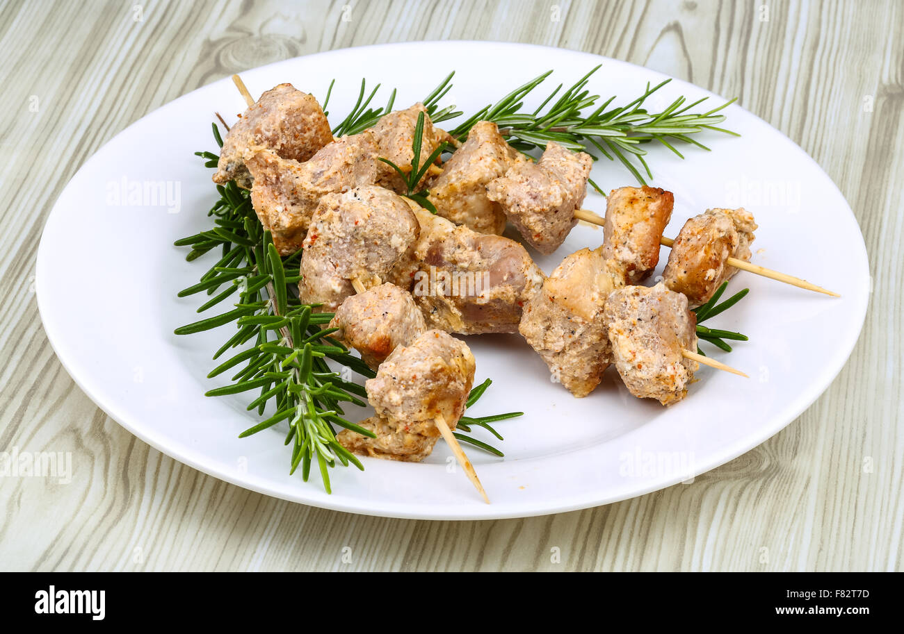 Chicken skewers with rosemary on the wwod background Stock Photo - Alamy