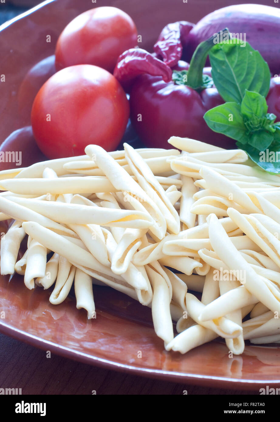 Typical Calabrian pasta called " fileja " with chilli and tomato, italy ...