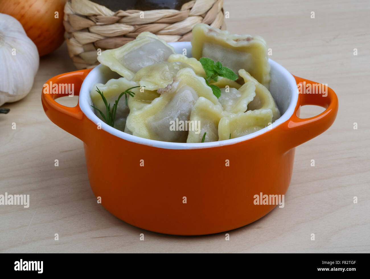 Italian dumplings Ravioli with fresh herbs and spices Stock Photo - Alamy