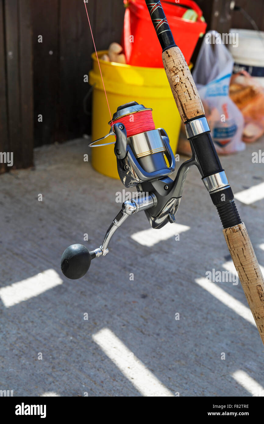 colorful spinning with reel for fishing close-up Stock Photo - Alamy