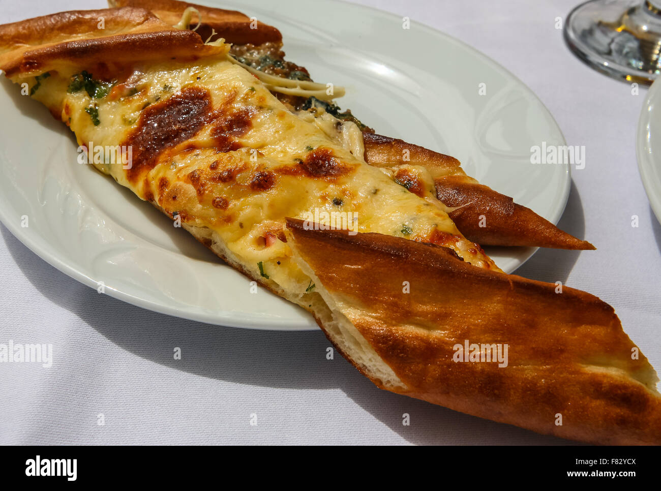 Turkish cheese pastry with fresh herbs and spices Stock Photo - Alamy