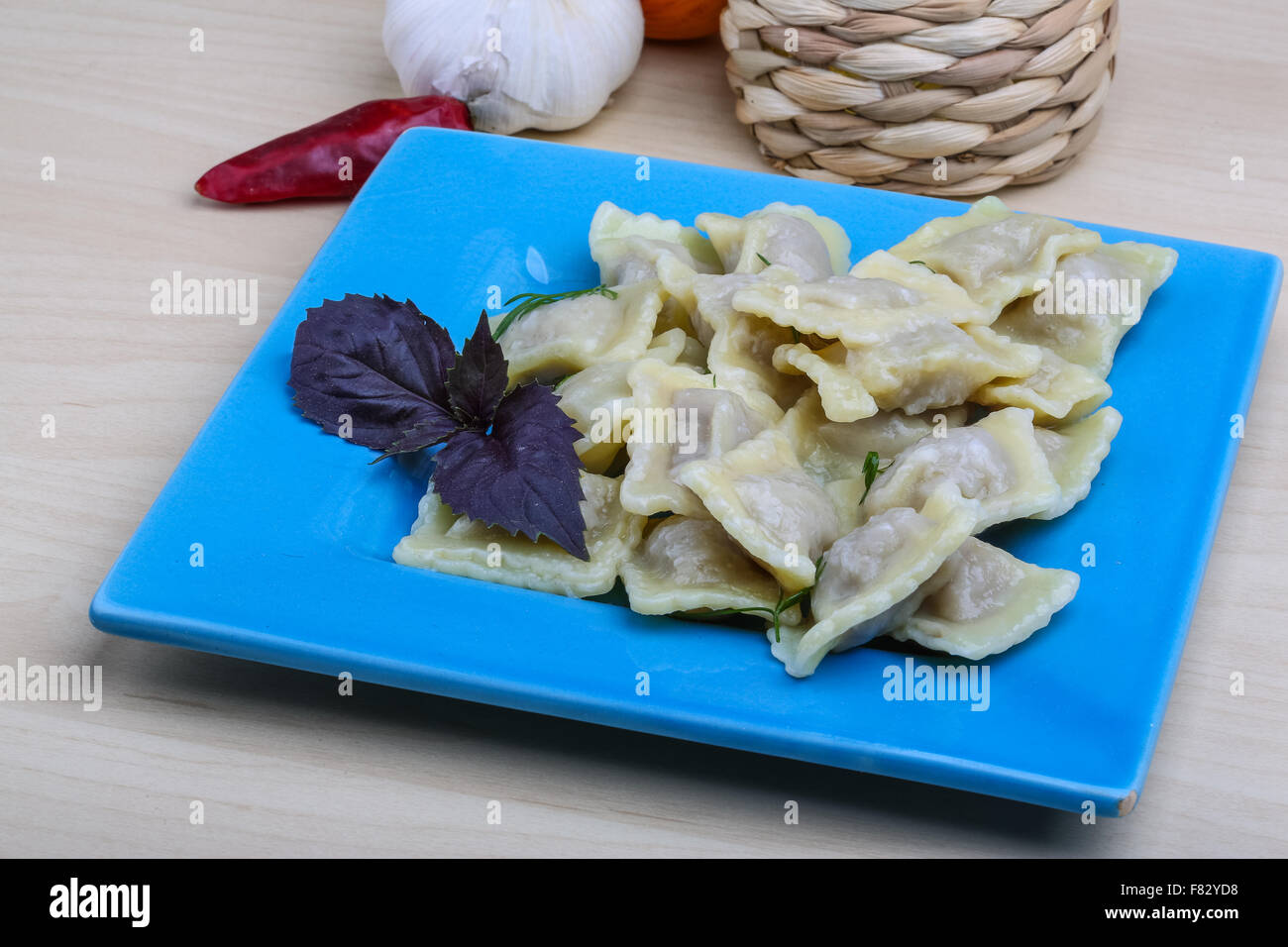 Italian dumplings Ravioli with fresh herbs and spices Stock Photo - Alamy