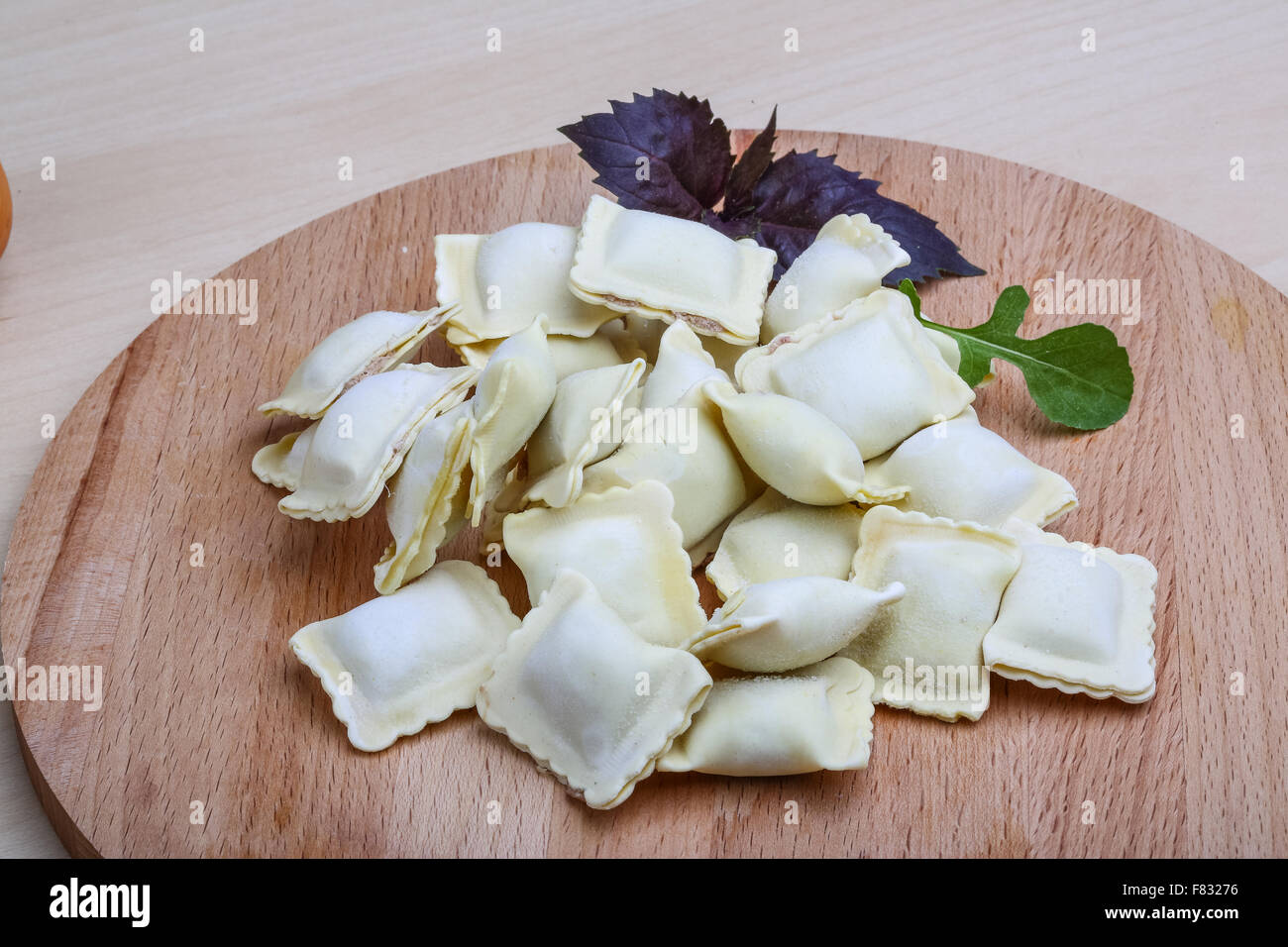 Raw ravioli with herbs - ready for cooking Stock Photo - Alamy