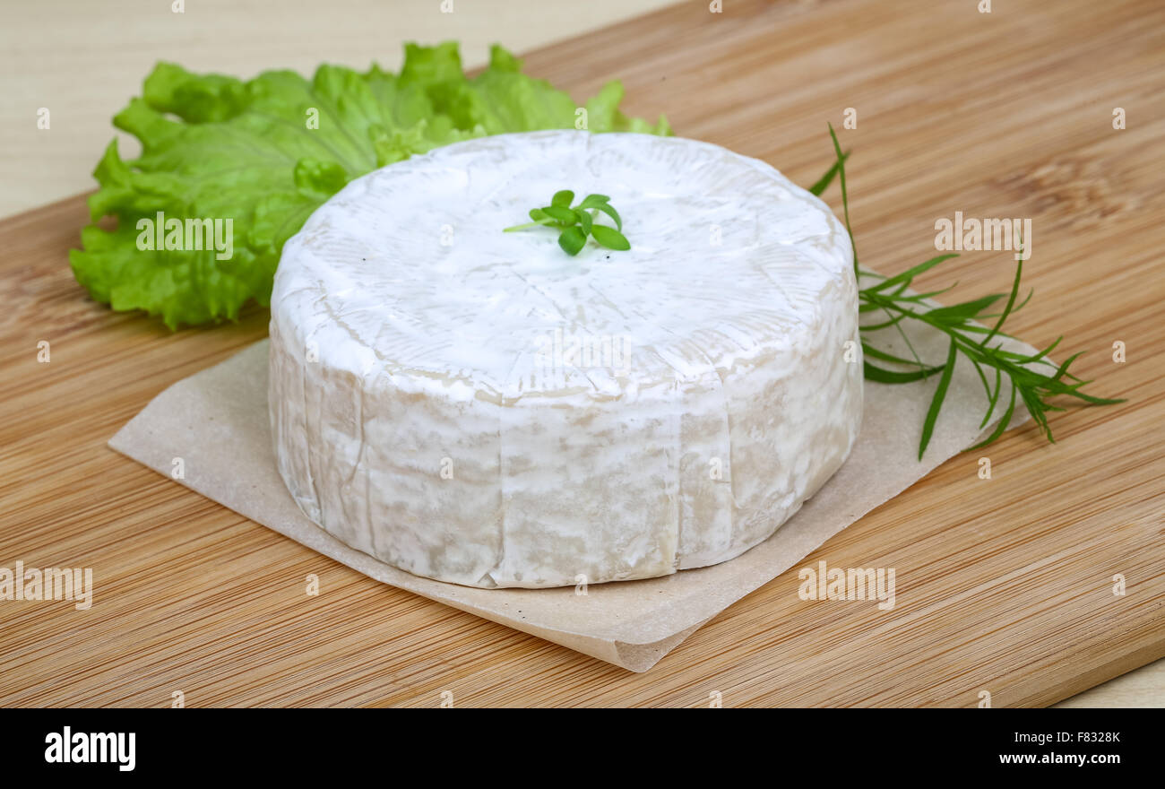 Camembert brie cheese with herbs on the wood background Stock Photo - Alamy