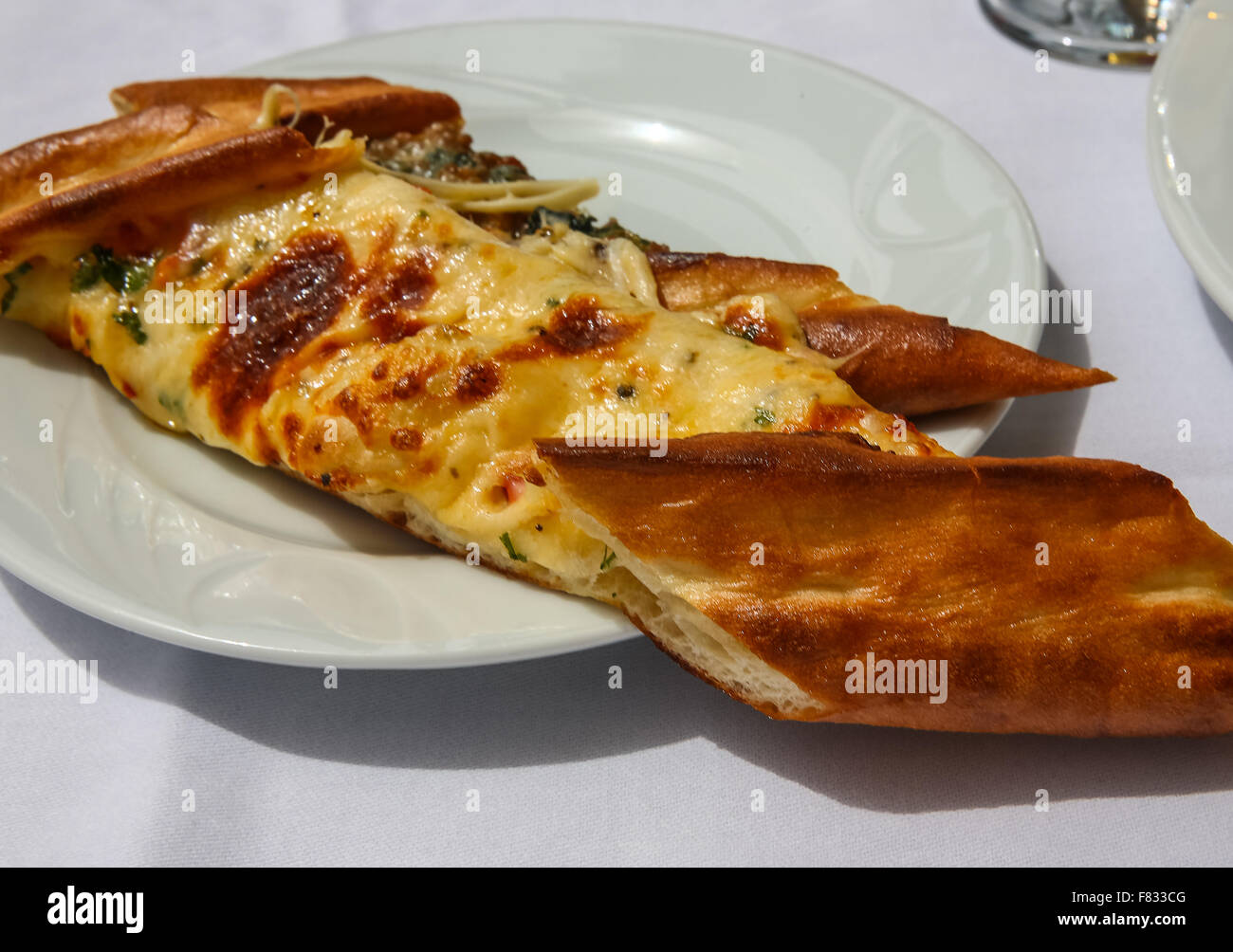 Turkish cheese pastry with fresh herbs and spices Stock Photo - Alamy