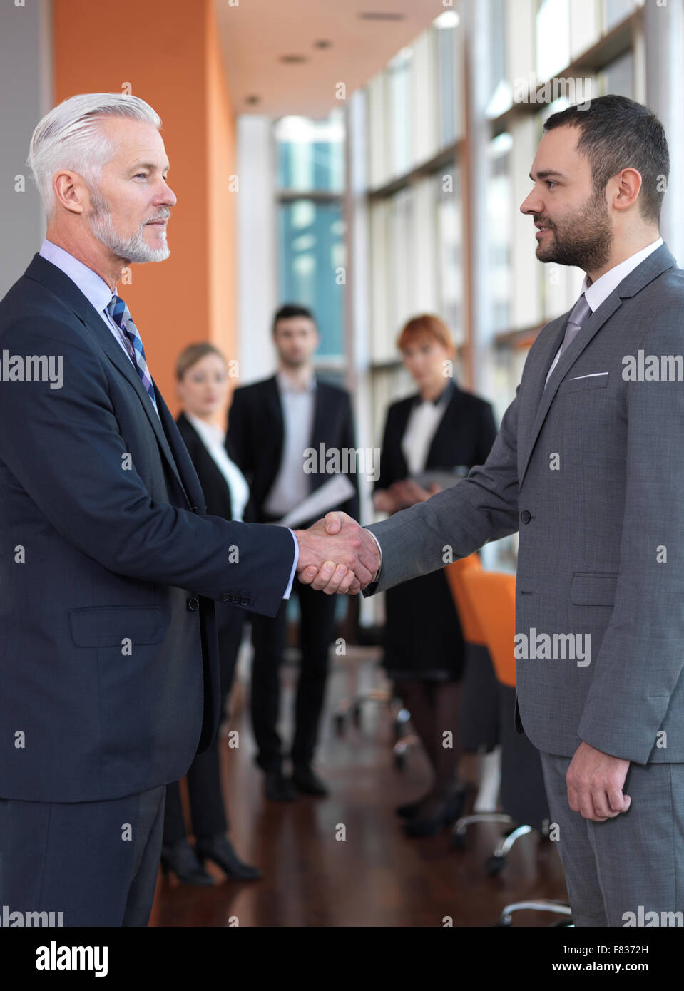 business partners, partnership concept with two businessman handshake ...