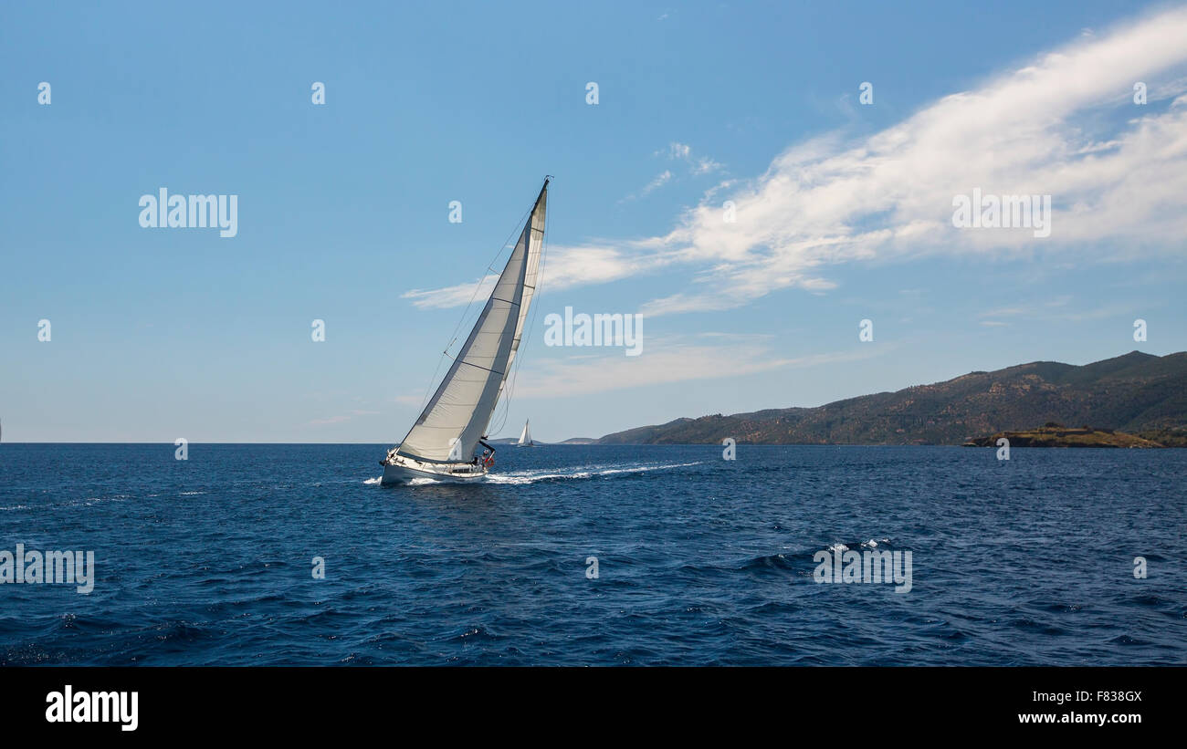 Sailing in the wind through the waves at the Sea Stock Photo - Alamy