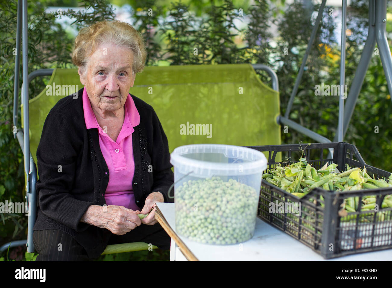 Mature lady eating peas hi-res stock photography and images - Alamy