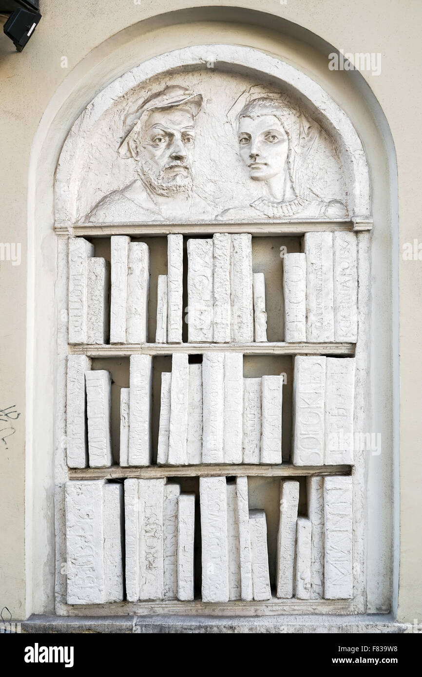 Stone bookcase sculpture in Krakow Stock Photo - Alamy