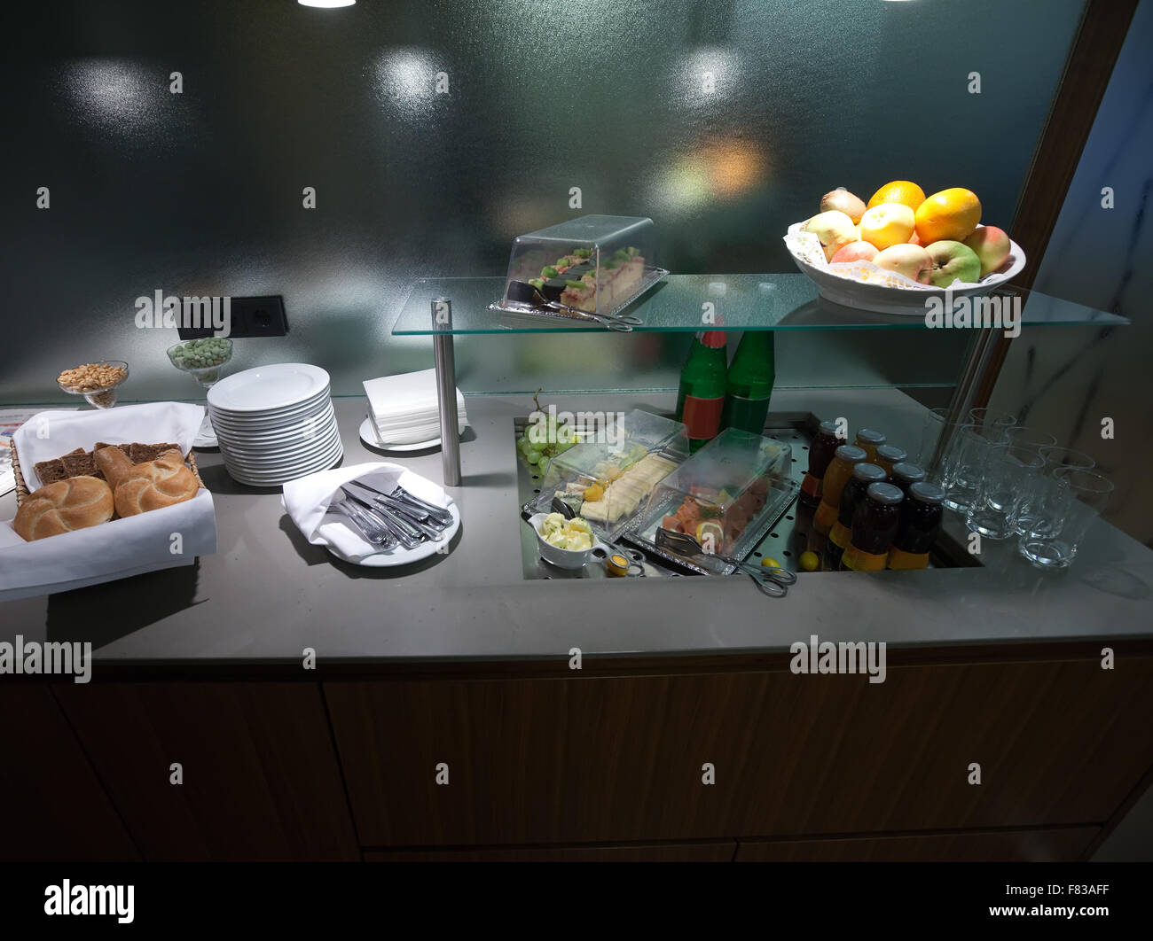 Buffet with cutlery and dessert Stock Photo - Alamy