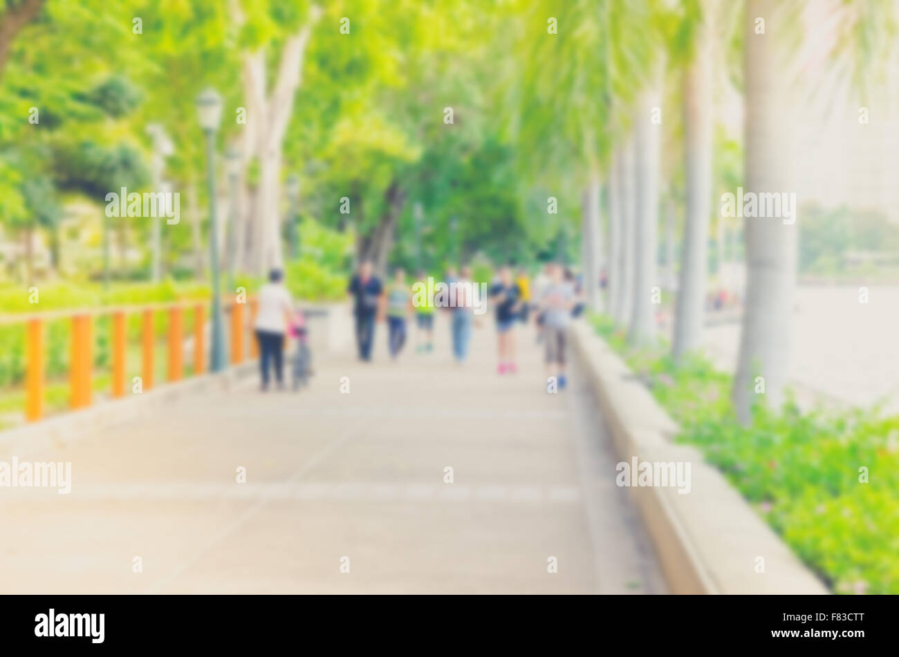blurred backgrounds of people exercise at parks outdoor:blur of people ...