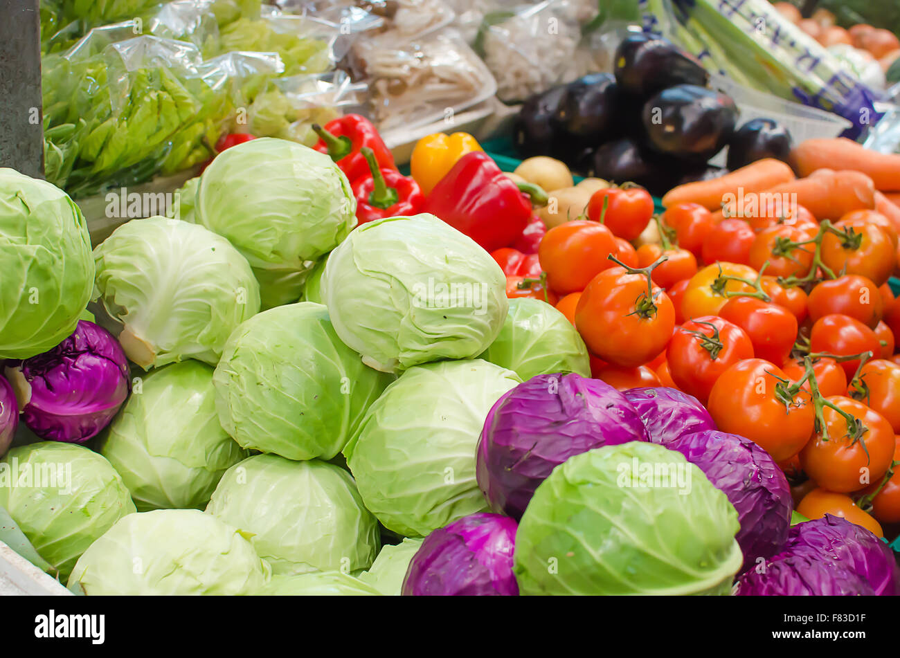 Cabbage and vegetables in market Stock Photo - Alamy