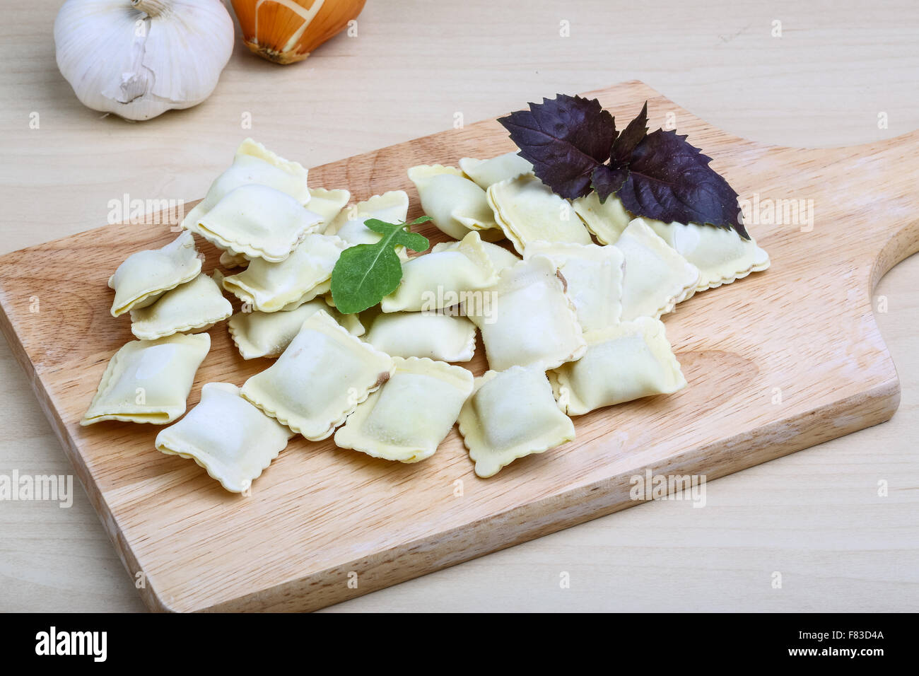 Raw ravioli with herbs - ready for cooking Stock Photo - Alamy