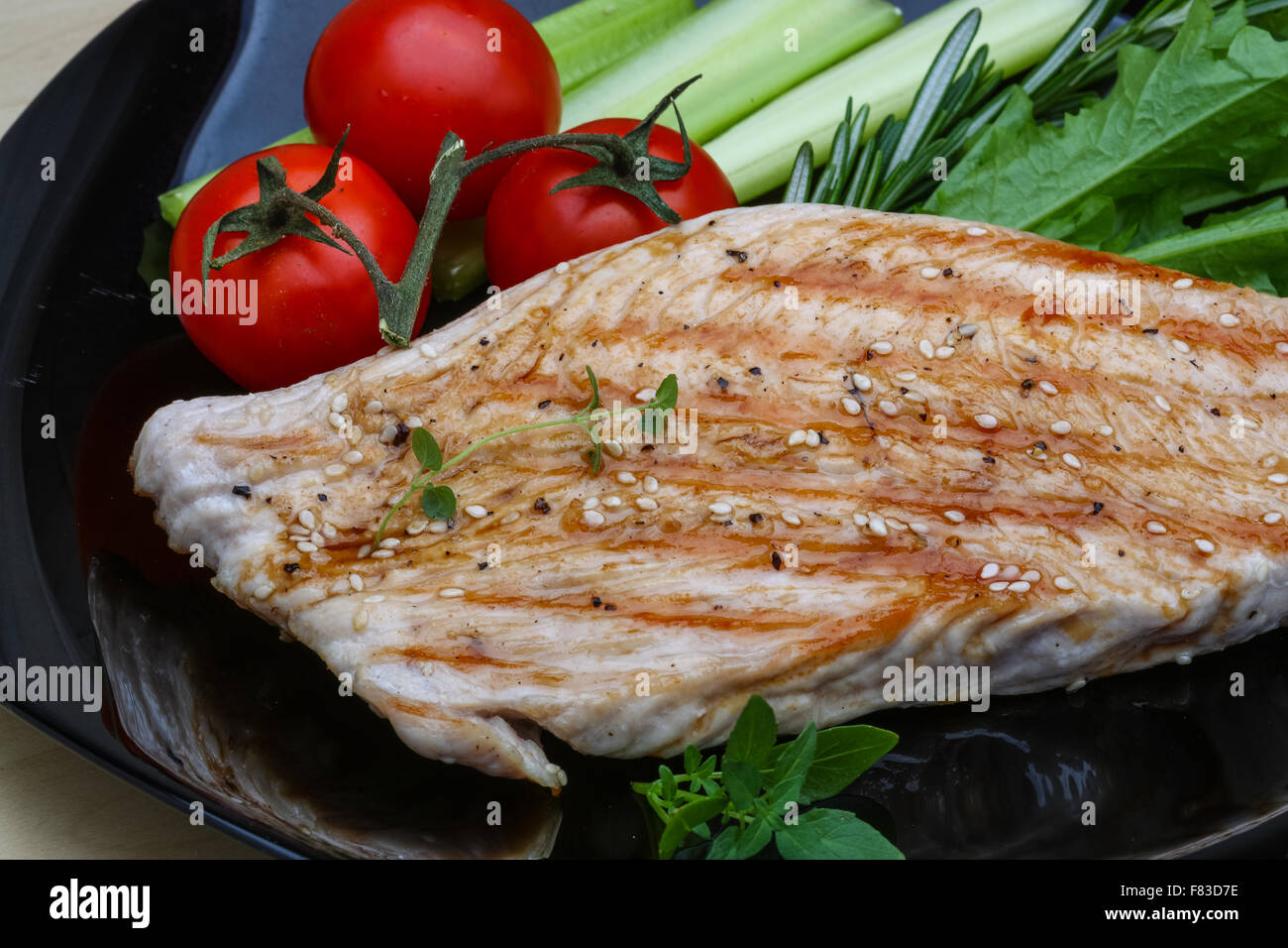 Grilled turkey steak with herbs and spices Stock Photo - Alamy
