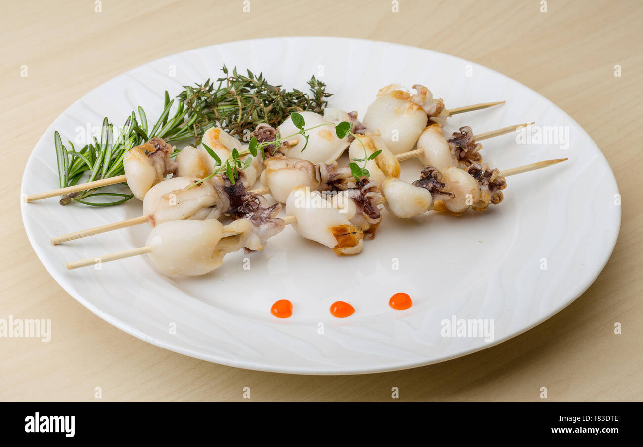 Grilled cuttlefish bbq with rosemary and pepper Stock Photo - Alamy