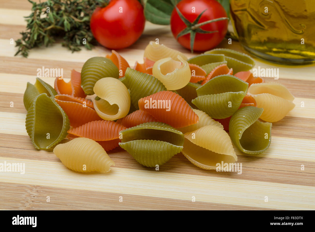 Pipe rigate pasta on the wood background Stock Photo - Alamy