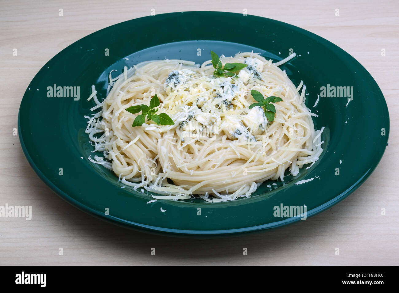 Pasta with blue cheese and fresh basil Stock Photo - Alamy