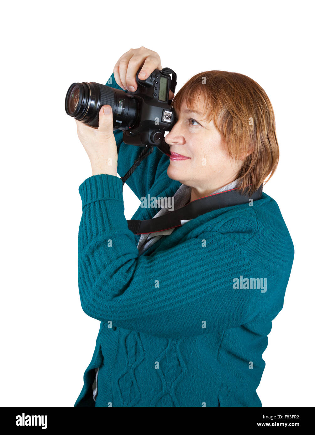 Senior woman taking photo with modern camera Stock Photo - Alamy