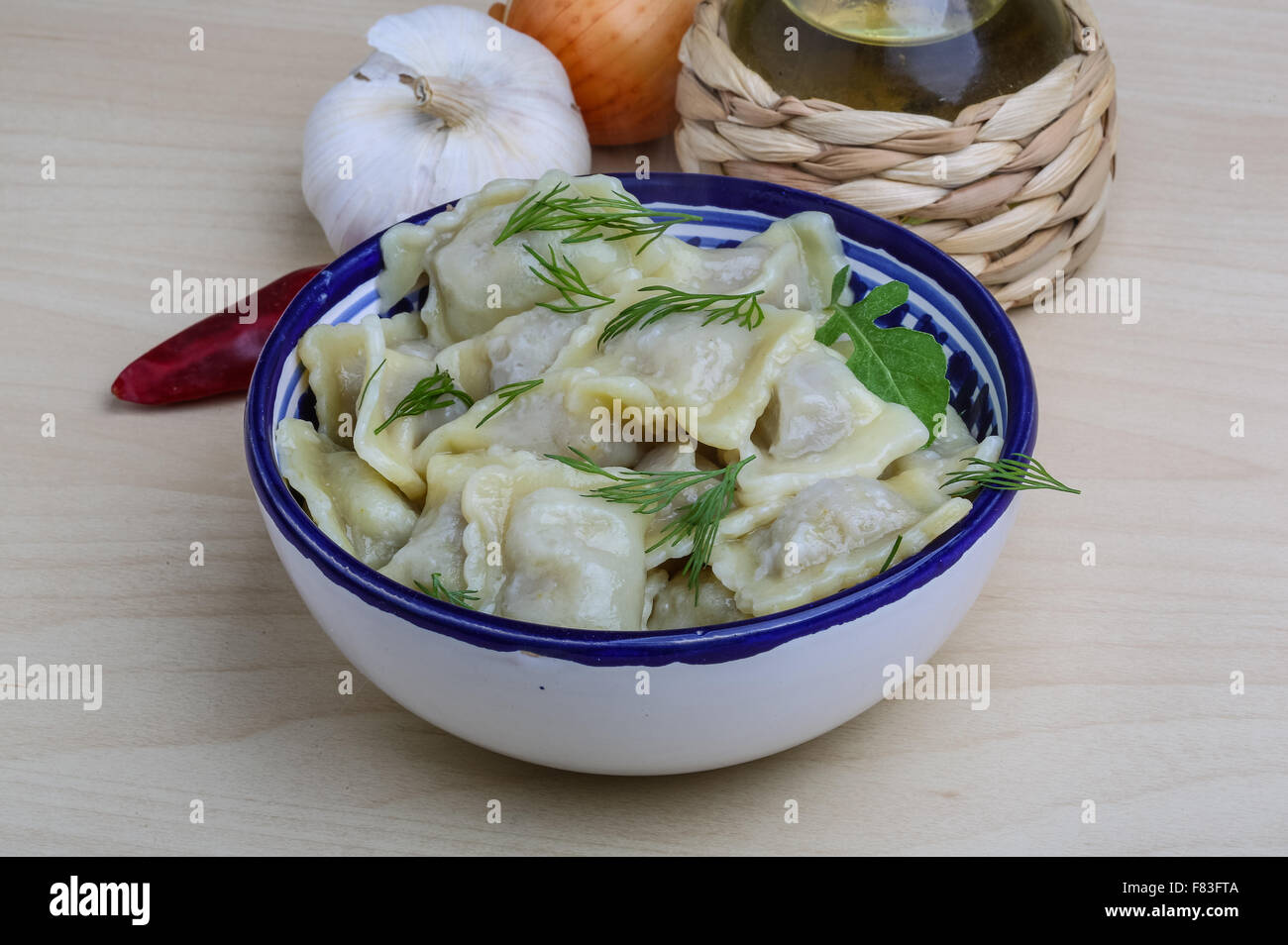 Italian dumplings Ravioli with fresh herbs and spices Stock Photo - Alamy