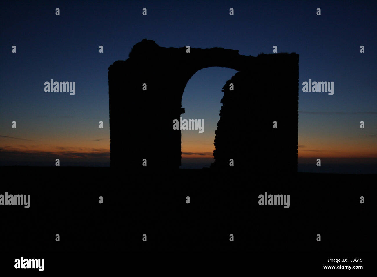 The ruin of the Pleasure House folly at Hartland Quay at sunset in ...