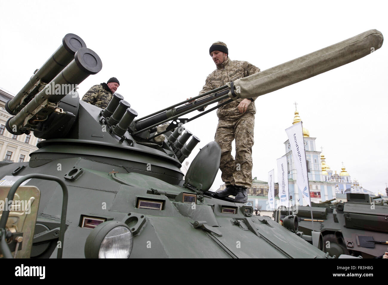 Kiev, Ukraine. 5th Dec, 2015. Ukrainian servicemen stand on the BTR-3 ...