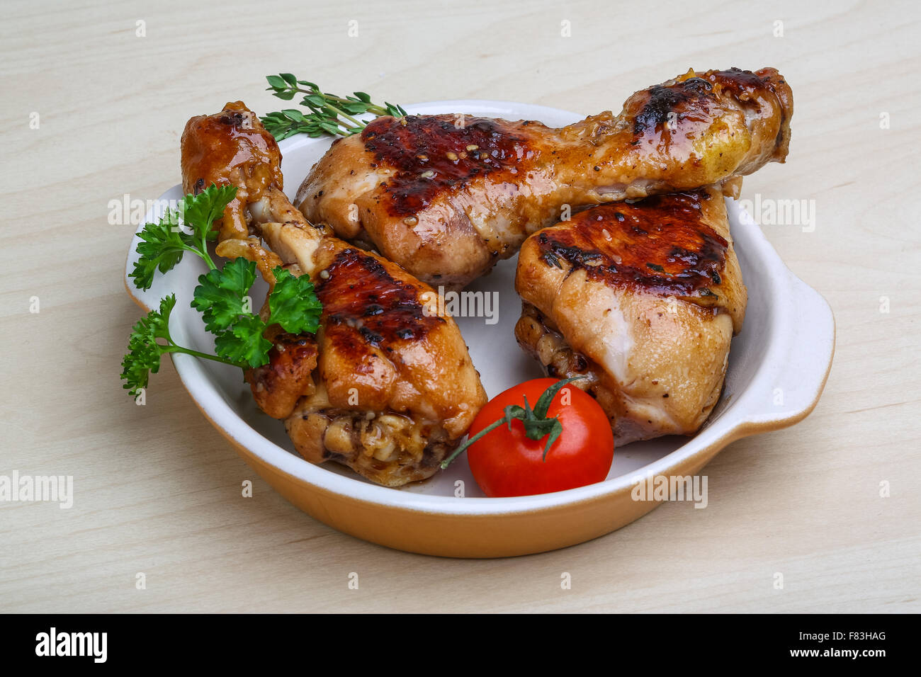 Roasted chicken legs in teriyaki sause with thyme Stock Photo - Alamy