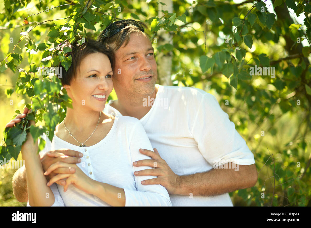 couple in summer park Stock Photo - Alamy
