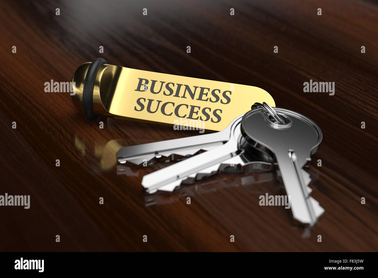 Room key with golden keychain business success concept on the wooden ...