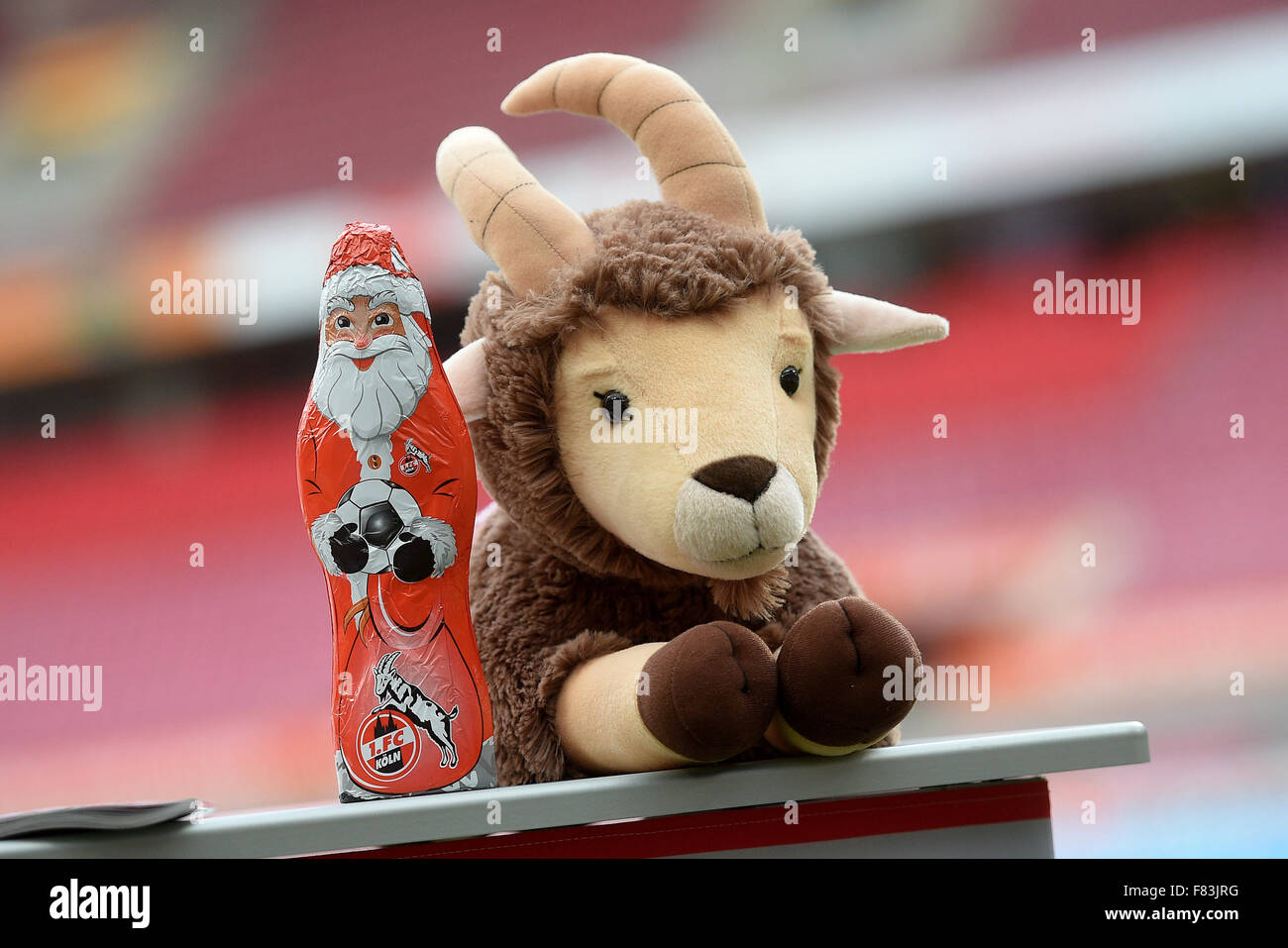 Cologne, Germany. 5th Dec, 2015. A chocolate Santa next to a goat ...