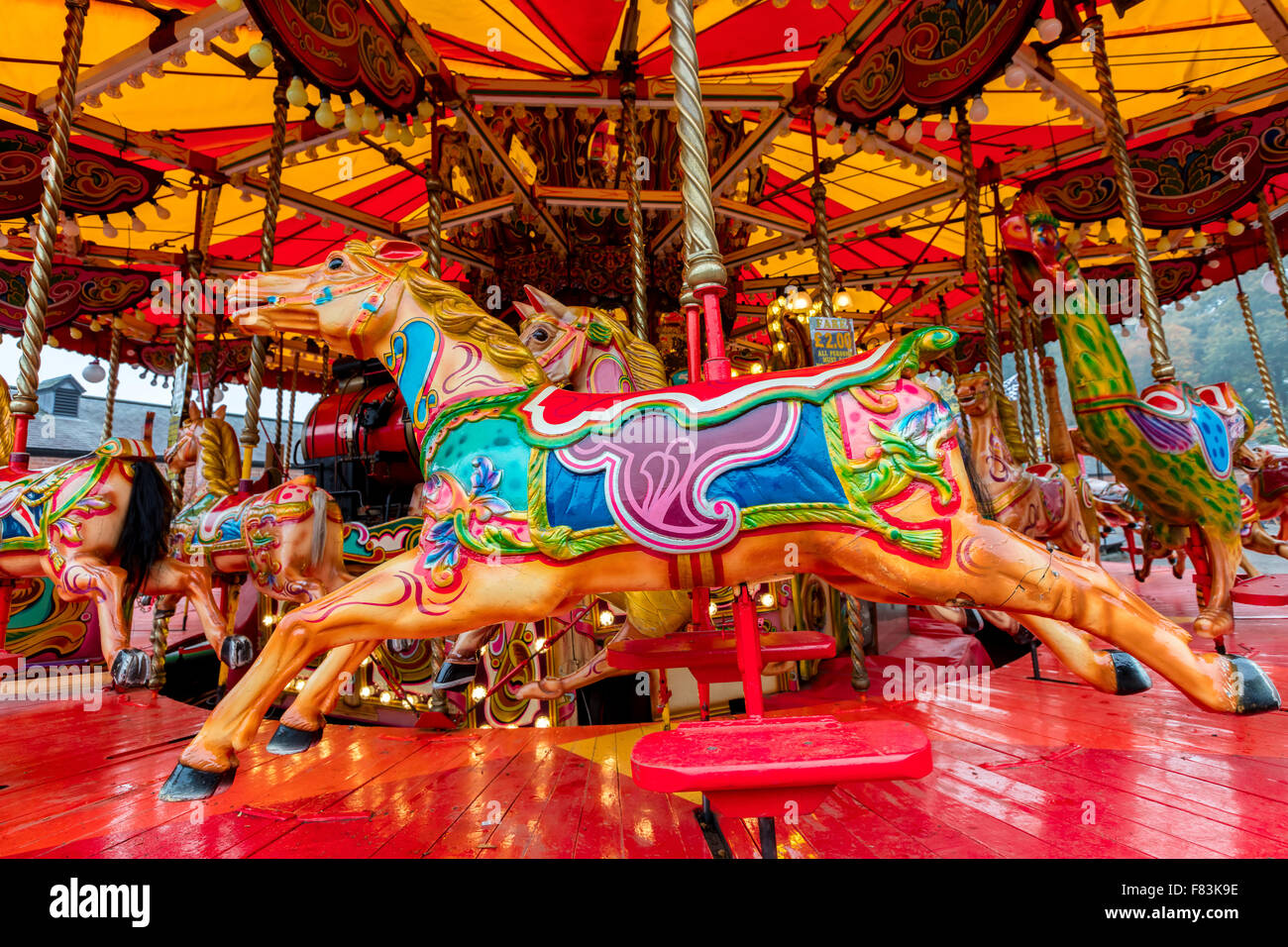 Carousel horses at the play ground Stock Photo - Alamy