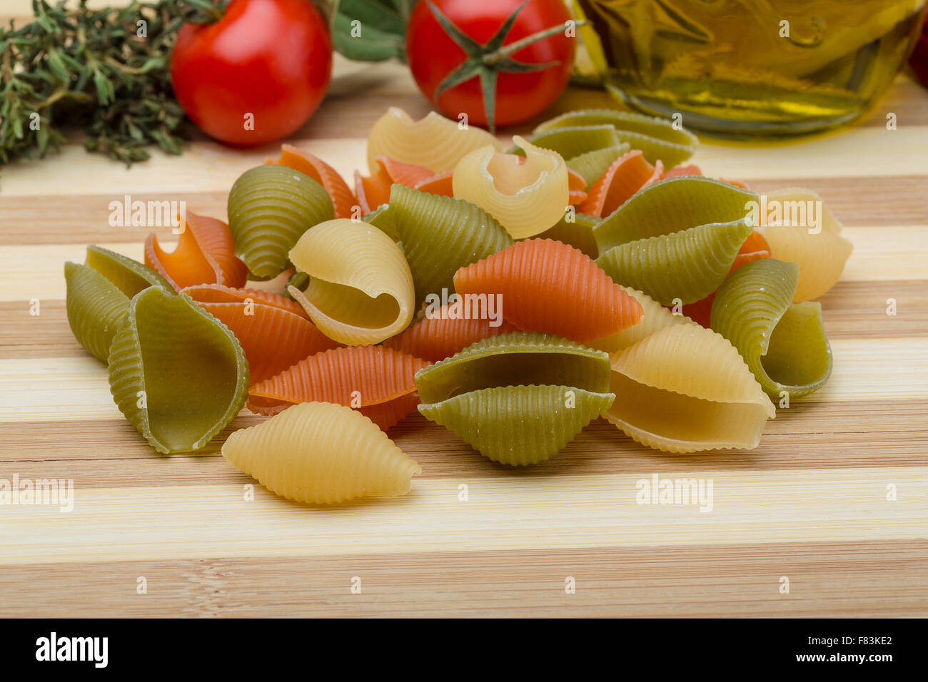 Pipe rigate pasta on the wood background Stock Photo - Alamy