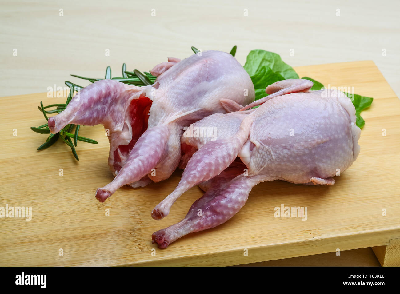 Raw quail with herbs ready for cooking Stock Photo - Alamy