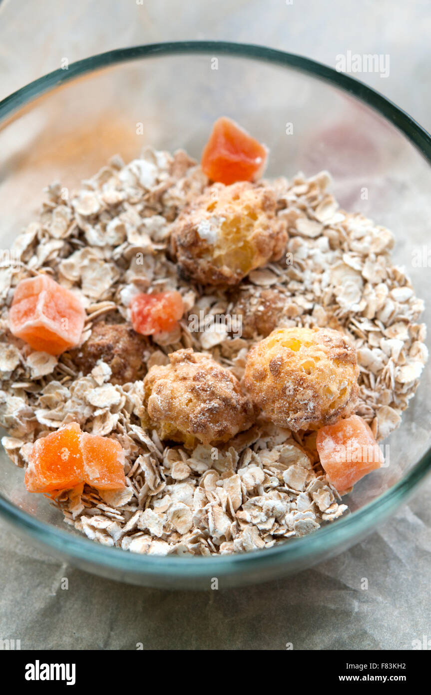 Bowl of cereal and dried fruits for healthy breakfast macro Stock Photo ...