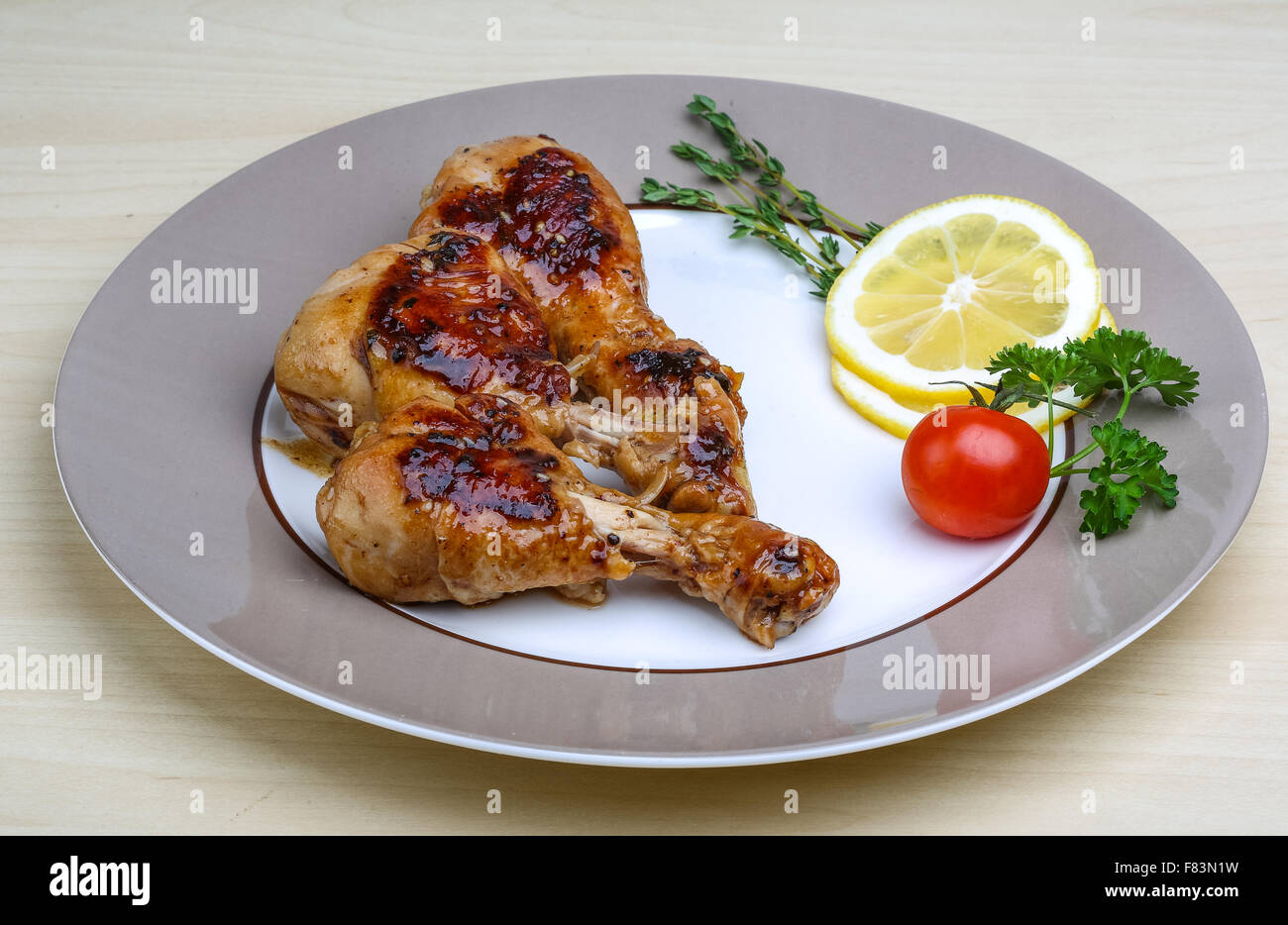 Roasted chicken legs in teriyaki sause with thyme Stock Photo - Alamy