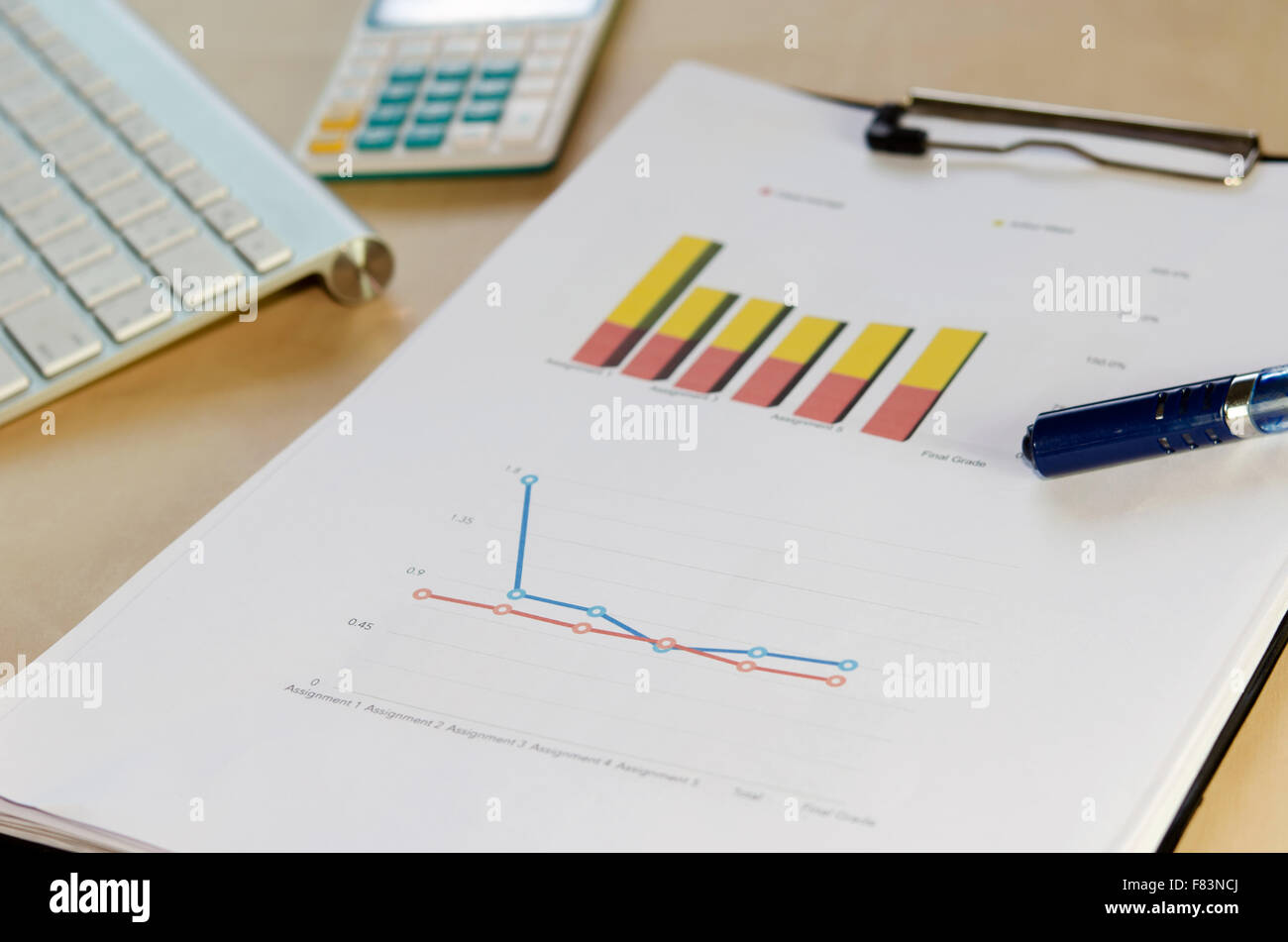 Documents, graphs on a desk Stock Photo - Alamy