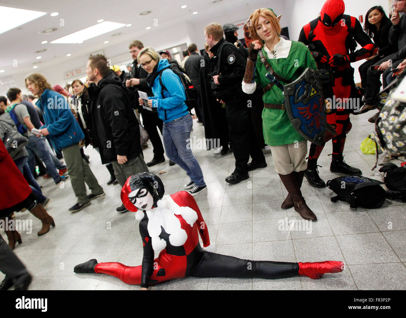 Dortmund, Germany. 5th Dec, 2015. A costumed visitor poses at the first ...