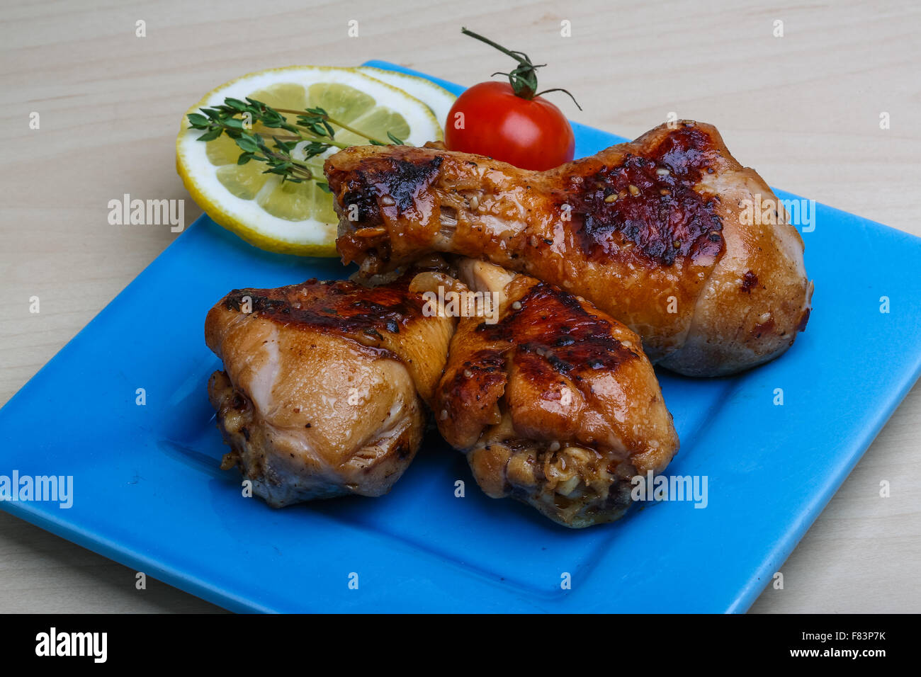 Roasted chicken legs in teriyaki sause with thyme Stock Photo - Alamy
